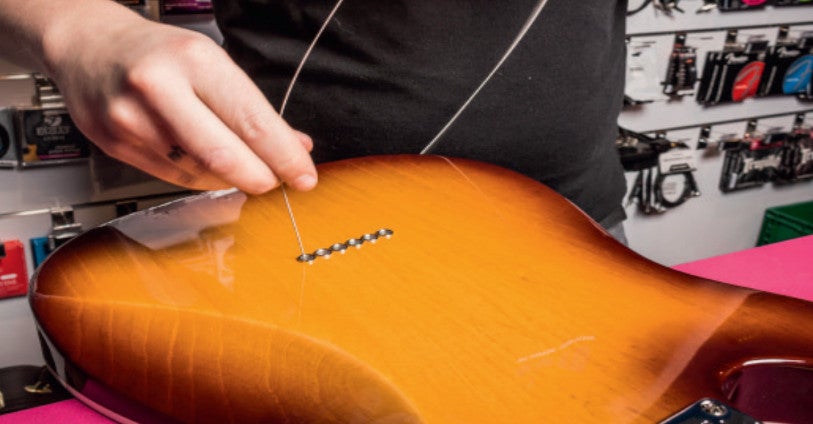 How To Change Electric Guitar Strings | Bax Music Blog
