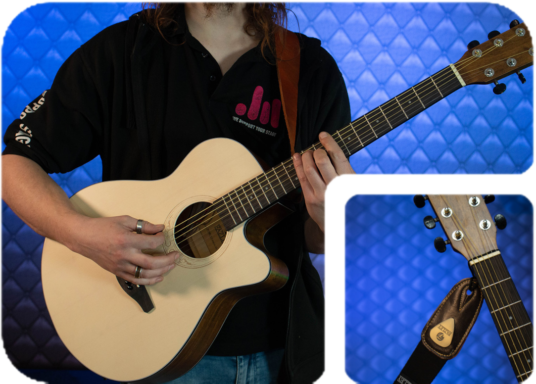 How To Hold a Guitar - Standing Up or Sitting Down